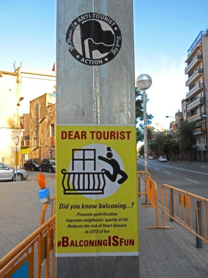 Posters encouraging tourists to jump off balconies spotted in Brit ...