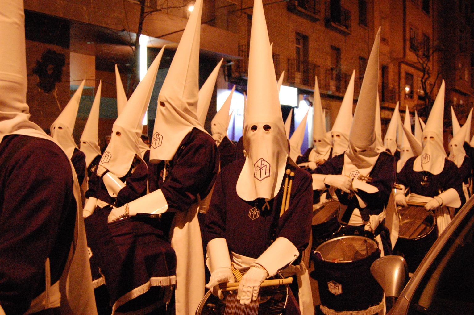 Why are the hats from Spain's Semana Santa processions conical and are ...
