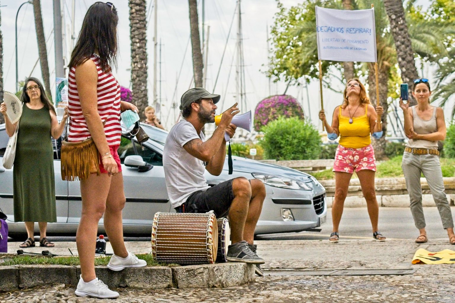 IN PICS: Locals in Spain's Mallorca condemn mandatory use of face masks ...