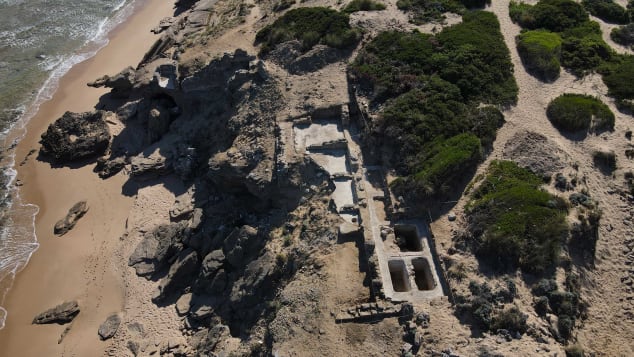 Ancient Roman bath complex emerges from shifting sands on beach in ...
