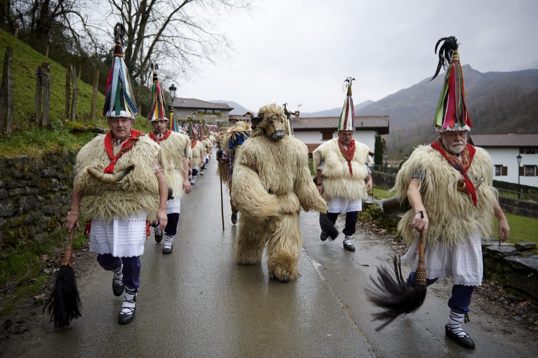 IN PICS: Bizarre and beautiful 'bear man' festival wards off winter's ...