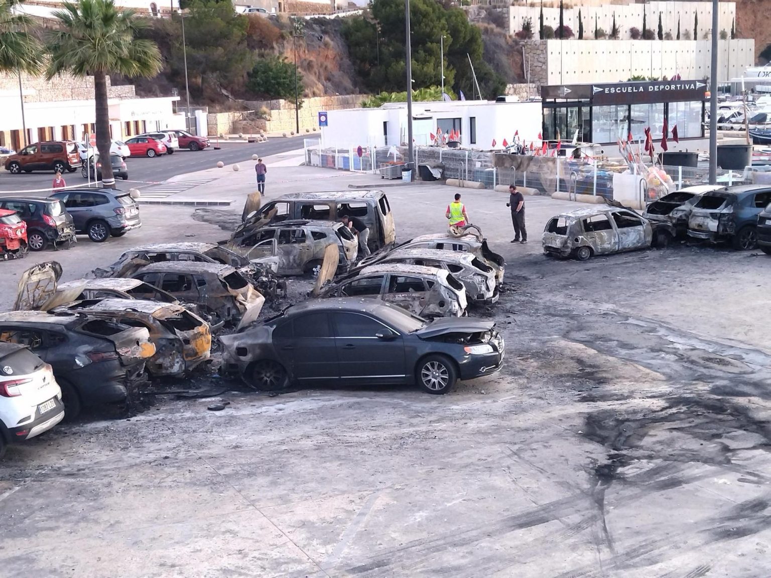WATCH: Huge fire engulfs 34 cars in port popular with tourists on Spain ...
