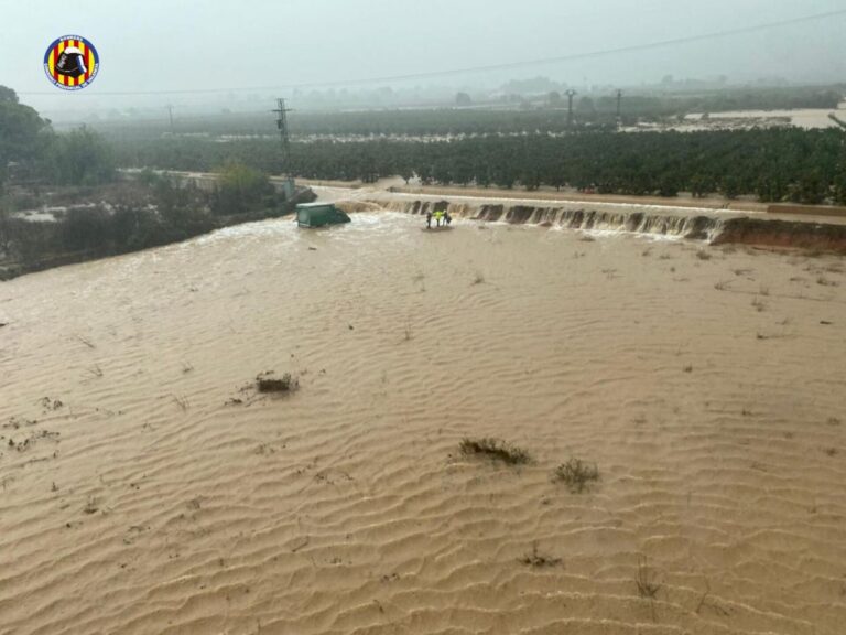 Weather mayhem in Spain's Valencia: Trains are cancelled while roads ...