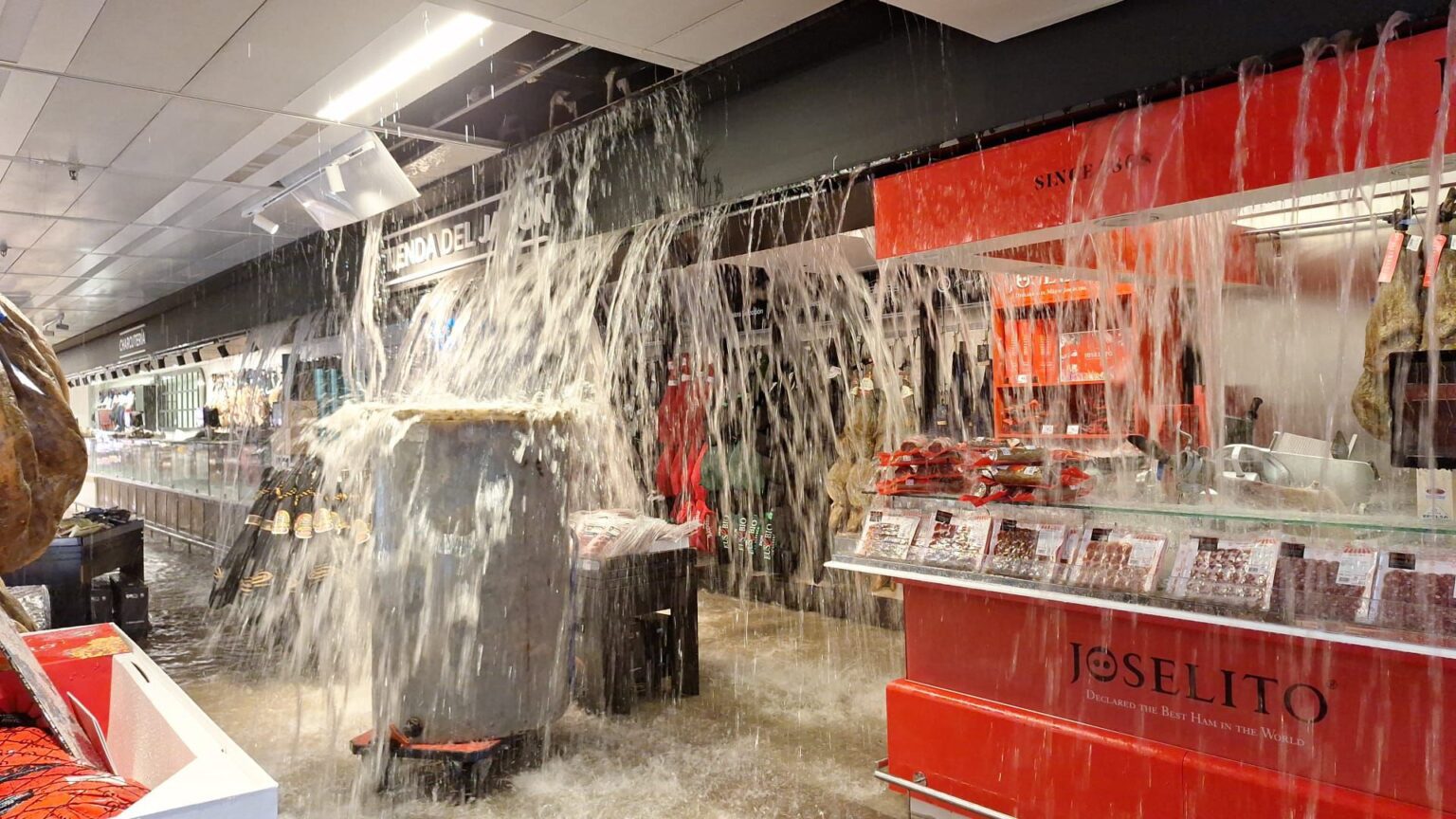 Watch: Rain gushes out of ceiling in El Corte Ingles in Malaga amid ...