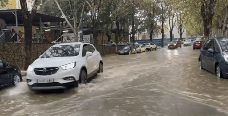 Travellers urged to 'check with airlines' as Malaga Airport is flooded ...