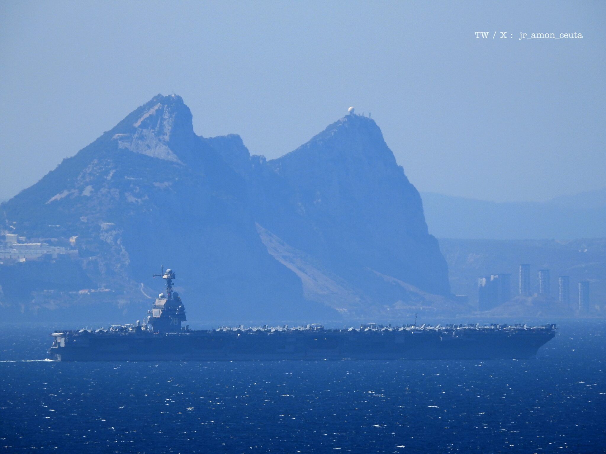 IN PICTURES: Spanish frigate escorts largest aircraft carrier in the ...
