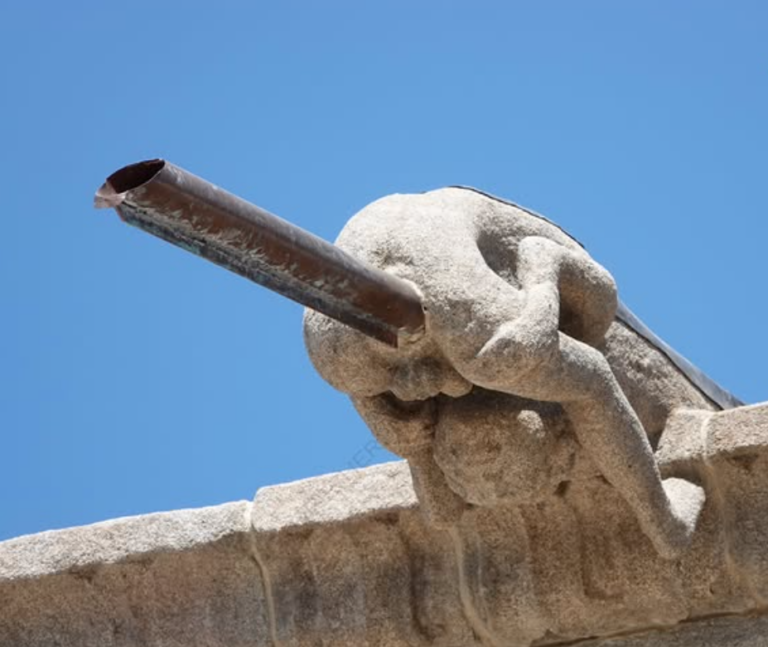 Gargoyles have pipes installed from backsides in Spanish UNESCO cathedral